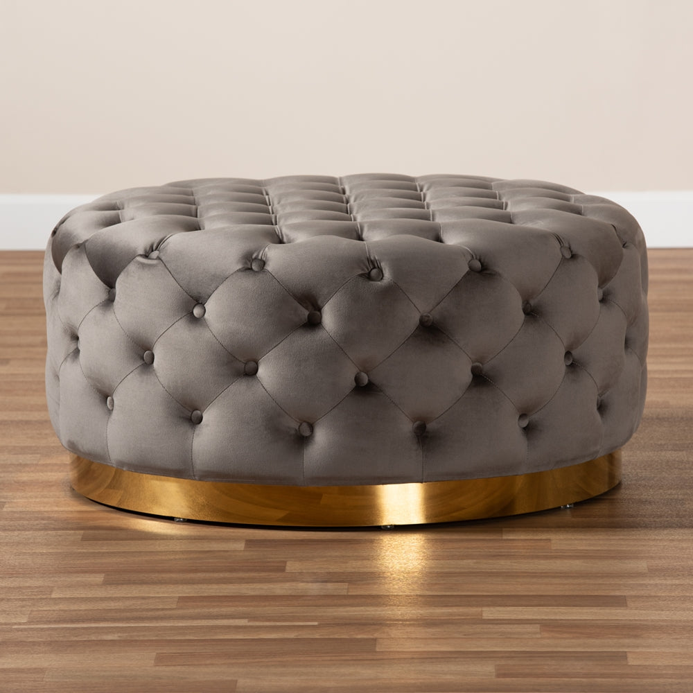 Sasha Glam and Luxe Grey Velvet Gold Finished Round Cocktail Ottoman